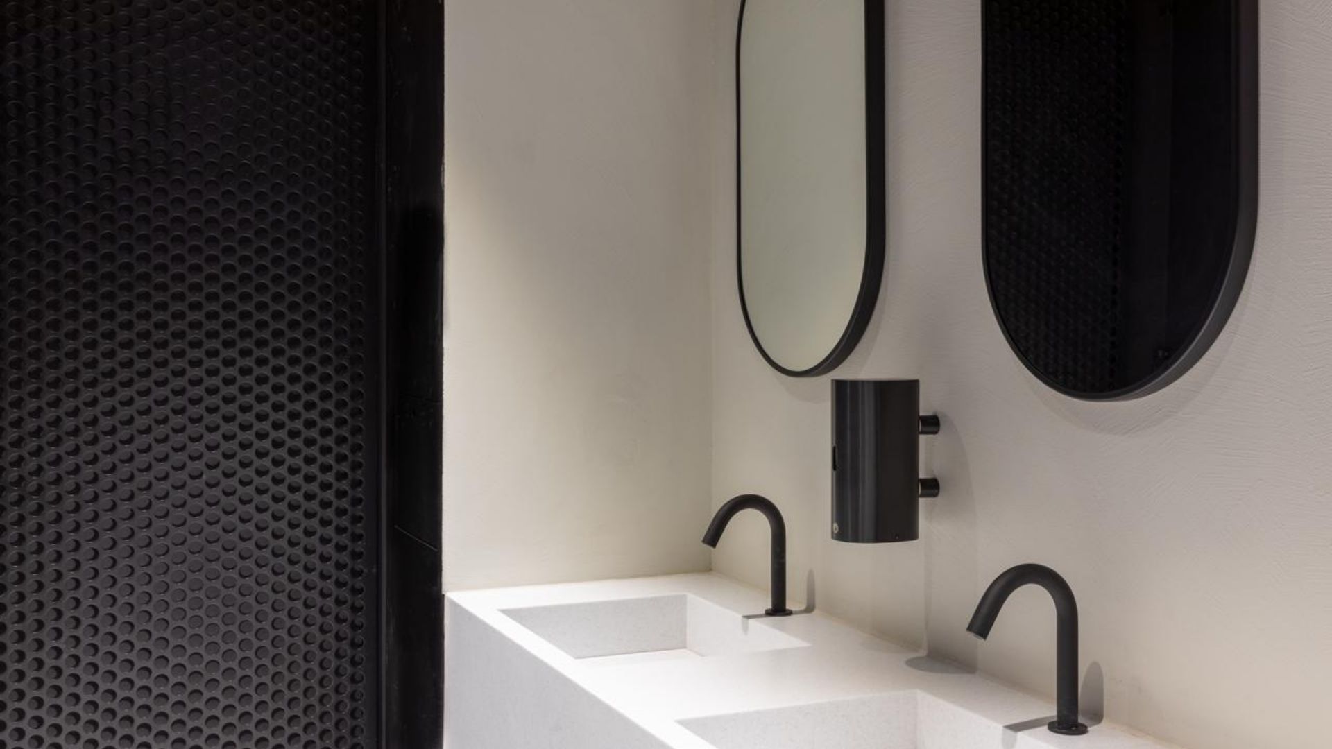 Flush-fronted washroom design for a landmark sustainable workspace ...